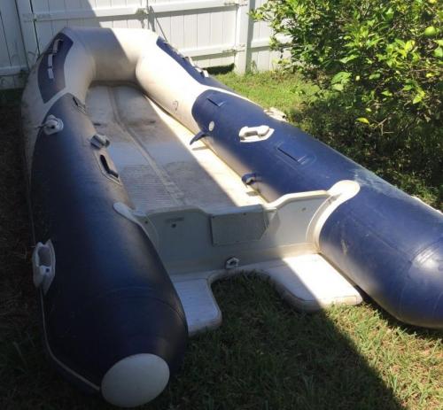 11.5’ West Marine HPV 350 inflatable boat with 9.9 Mercury Motor ...